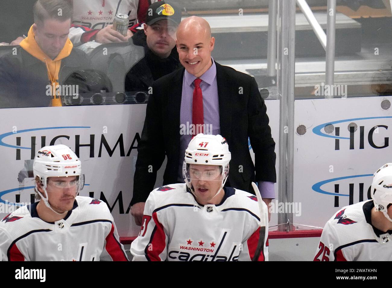 Washington Capitals head coach Spencer Carbery stands behind his bench ...