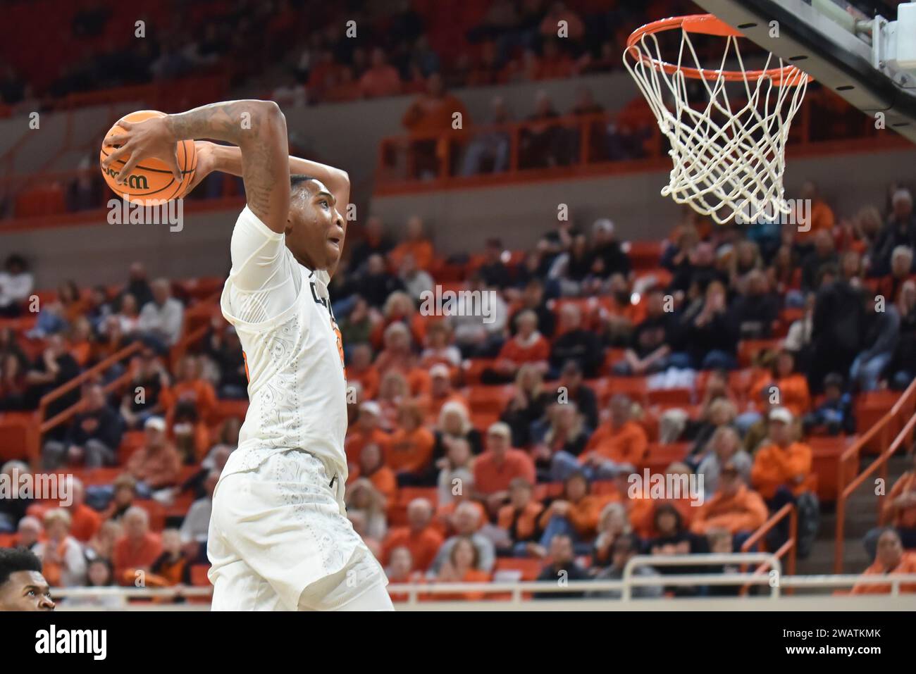 Oklahoma State center Brandon Garrison goes up to dunk during the ...