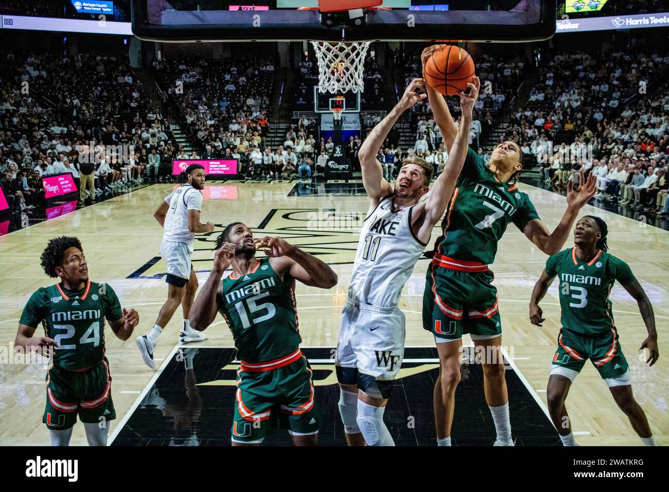 January 6, 2024: Wake Forest forward Andrew Carr (11) and Miami (Fl ...
