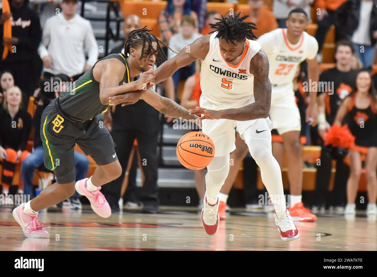 Oklahoma State guard Quion Williams, right, steals the ball from Baylor ...