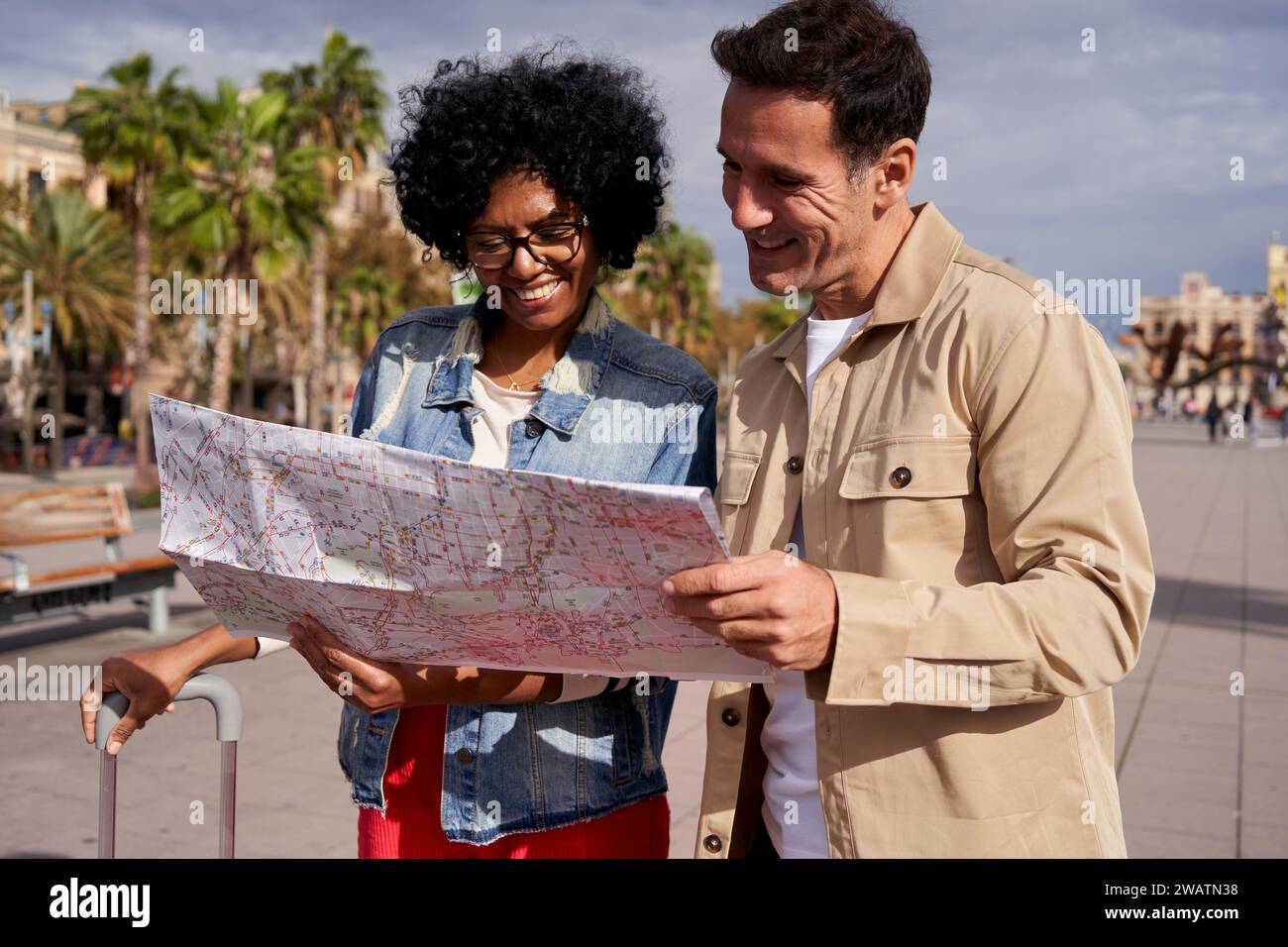 Man using a paper map hi-res stock photography and images - Alamy