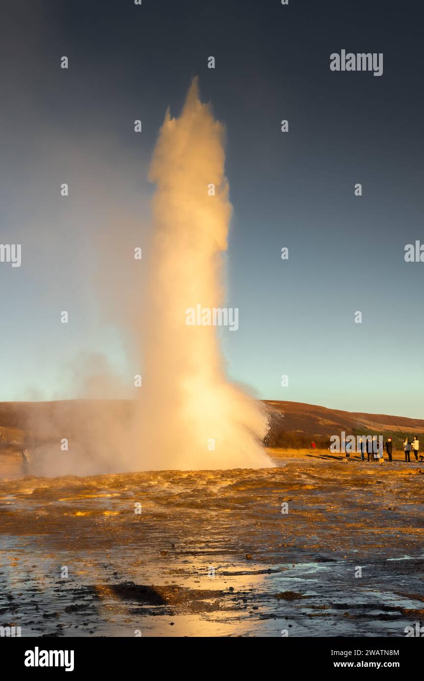 Stokkur geyser spectacular eruption in front of the sun, Iceland Stock ...