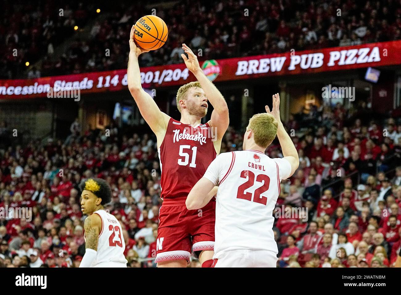 Nebraska's Rienk Mast (51) against Wisconsin's Steven Crowl (22) during ...