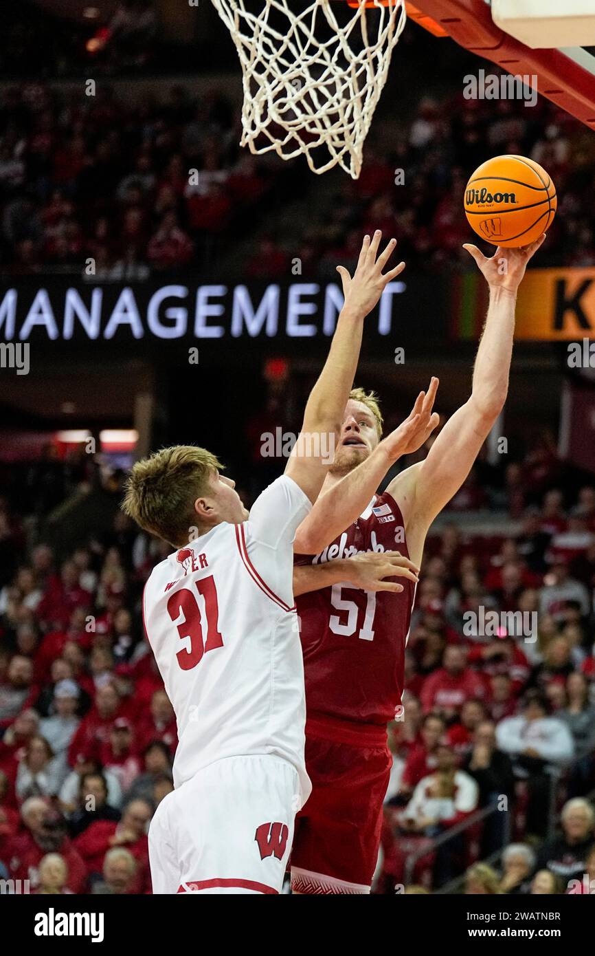 Nebraska's Rienk Mast (51) against Wisconsin's Nolan Winter (31) during ...