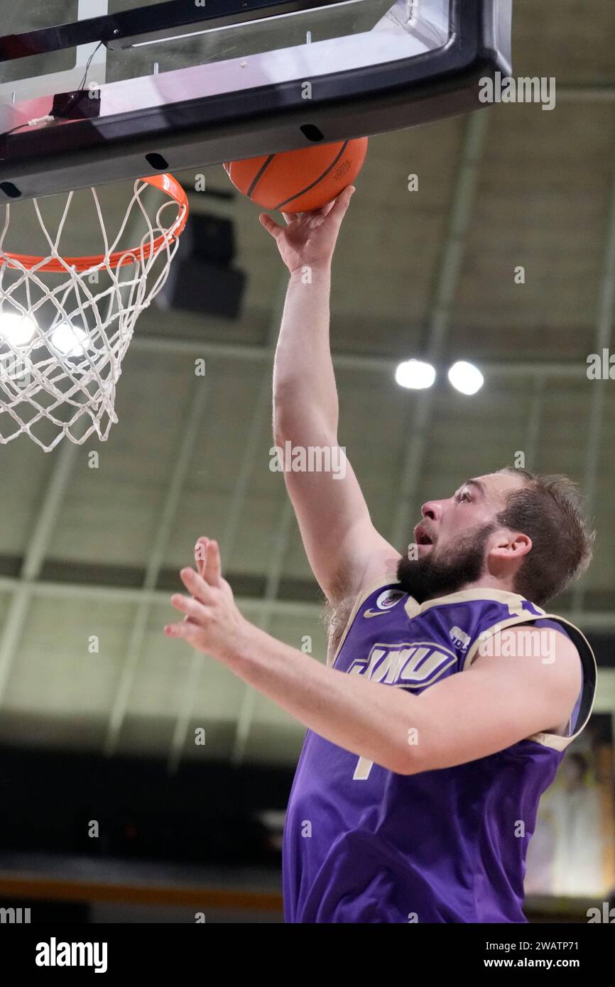 James Madison guard Noah Freidel (1) shoots a layup during the first ...