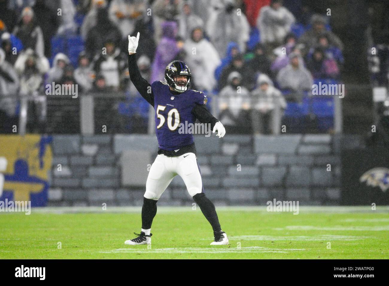 Baltimore Ravens linebacker Kyle Van Noy reacts after a play against ...