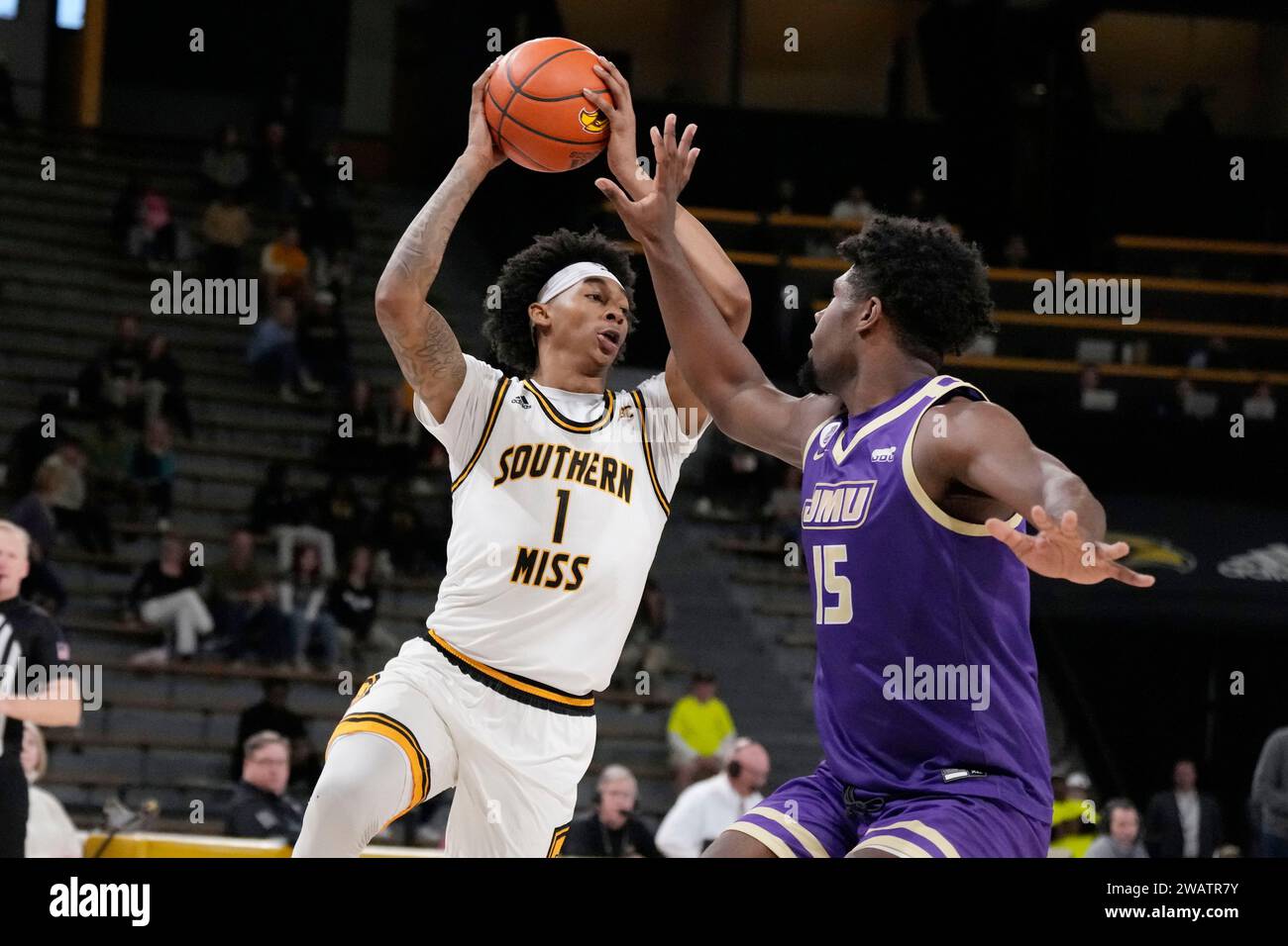 Southern Mississippi guard Austin Crowley (1) tries to pass the ball ...