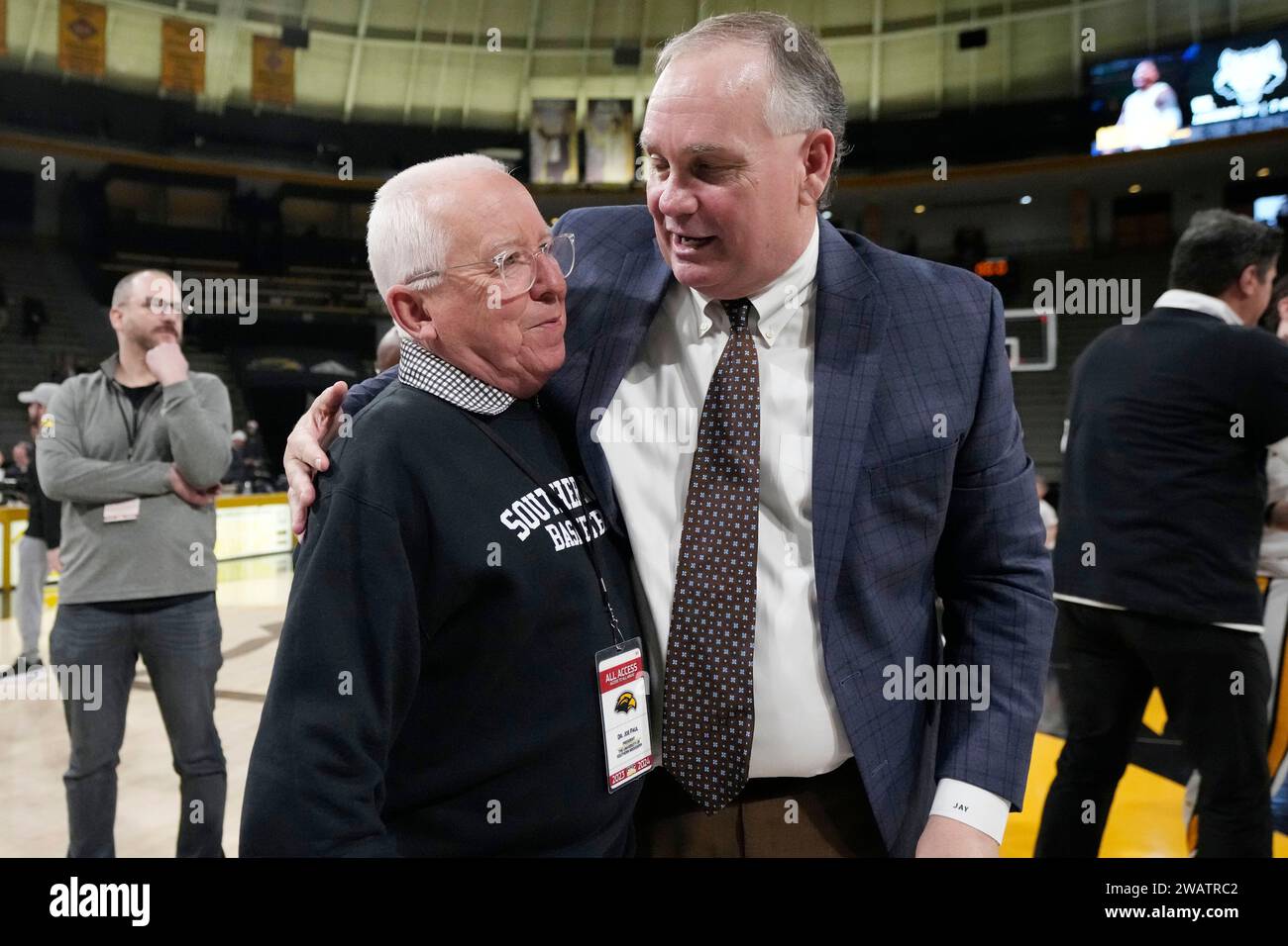 Southern Mississippi head coach Jay Ladner, center right, is ...