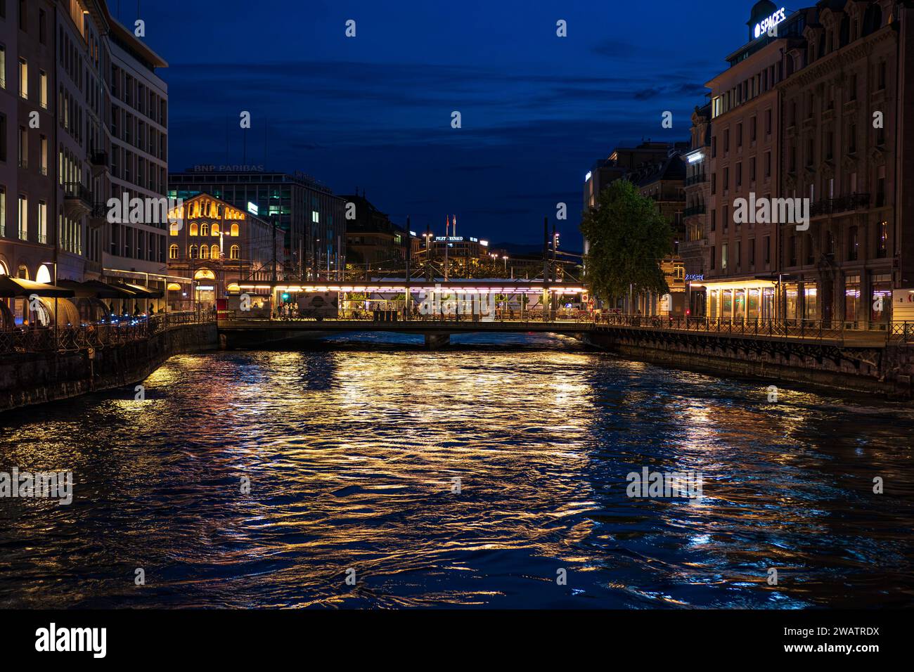 Geneva, Switzerland 8 September 2023: Night riverside view with ...