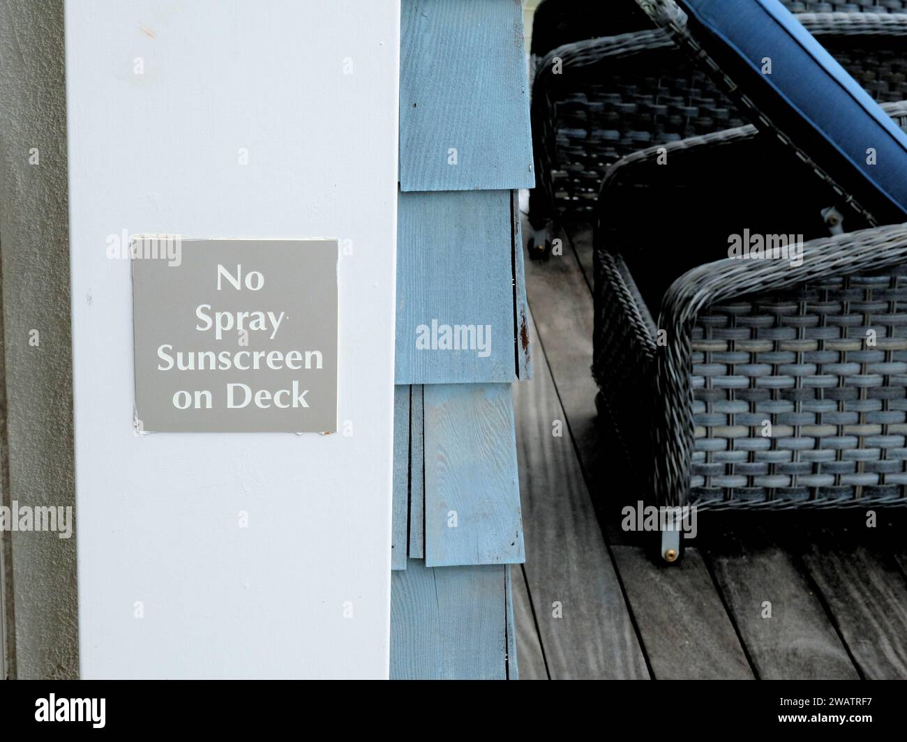 Sign warning visitors: No Spray Sunscreen on Deck; sunscreen chemicals ...