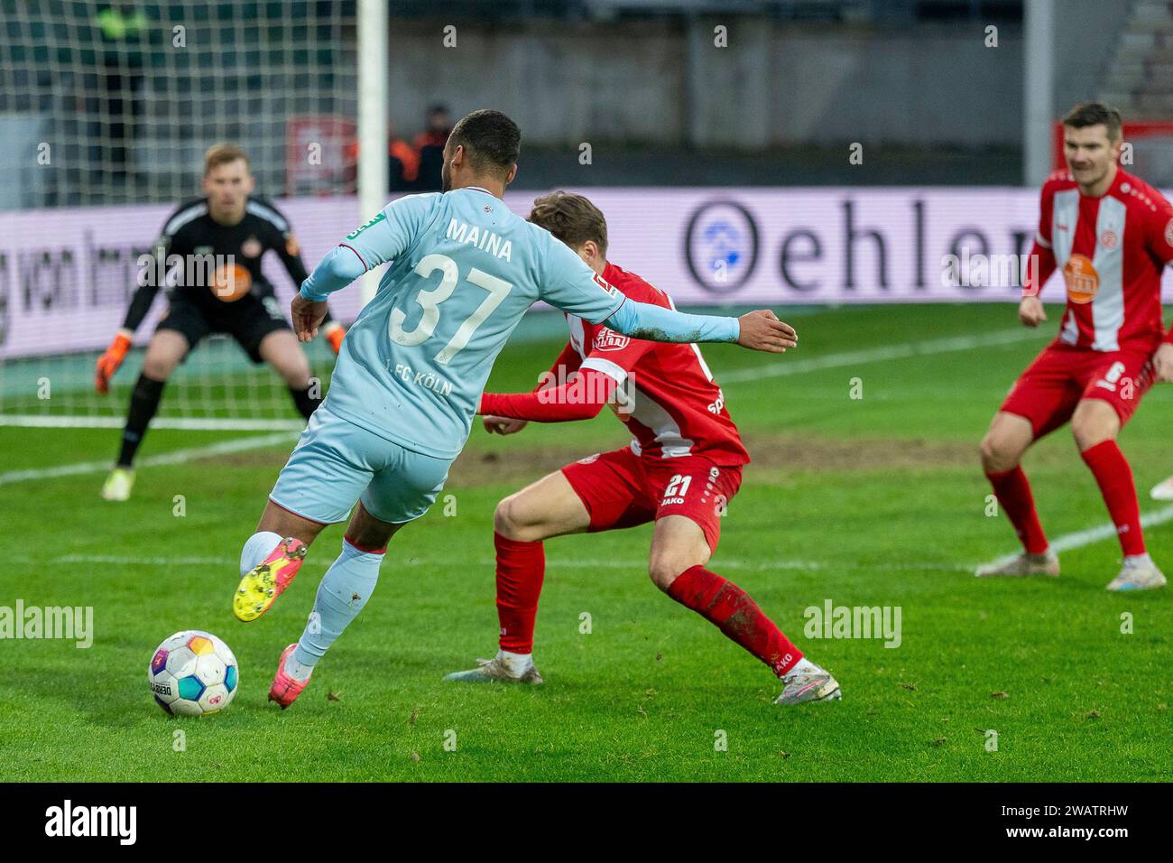 Essen, Deutschland. 06th Jan, 2024. Linton Maina (1. FC Koeln, #37), Sandro Plechaty (Rot-Weiss ...