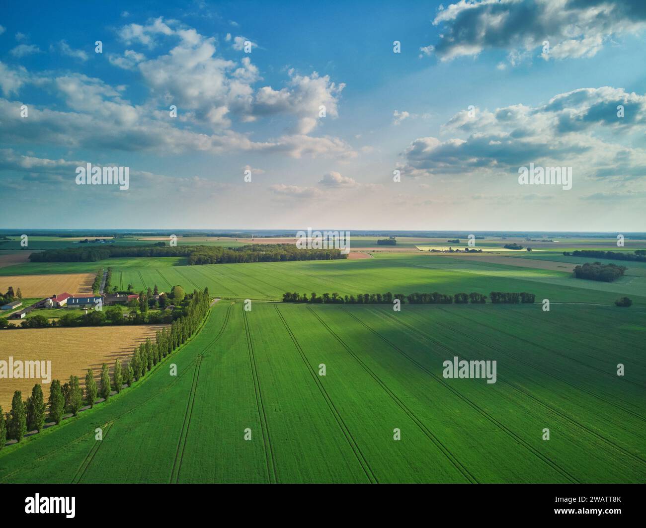 Aerial drone view of green fields and meadows in Yveliness,, near Paris ...