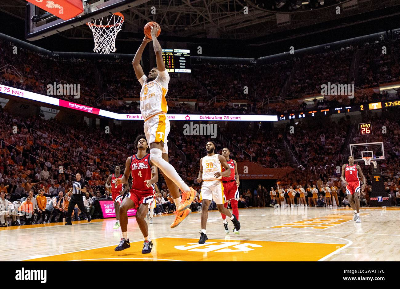 Tennessee forward Jonas Aidoo (0) dunks the ball past Mississippi ...