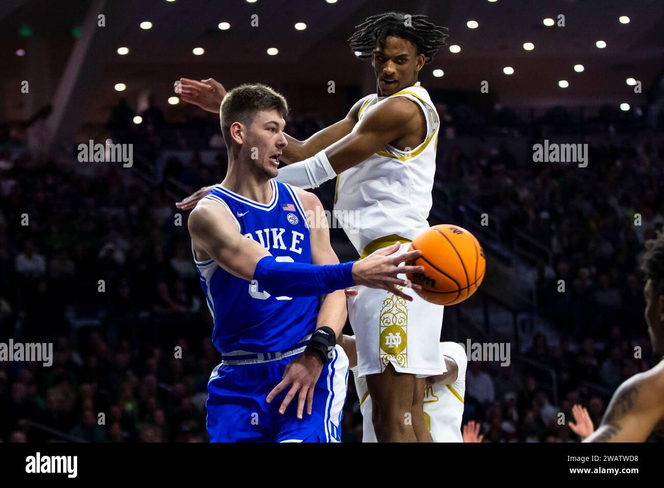 Duke's Kyle Filipowski (30) passes the ball past Notre Dame's Carey ...