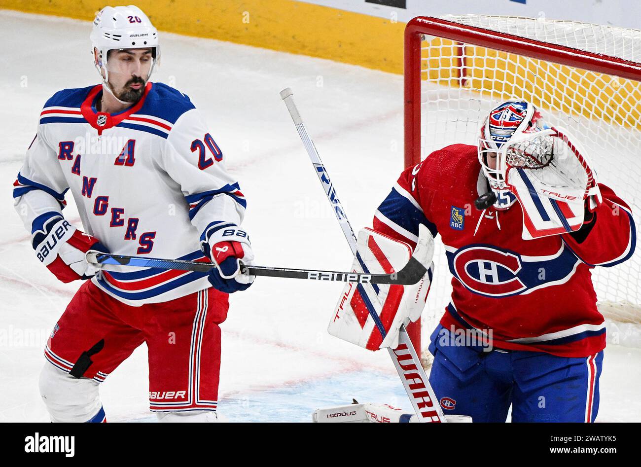 New York Rangers' Chris Kreider (20) tries to tip the puck past ...