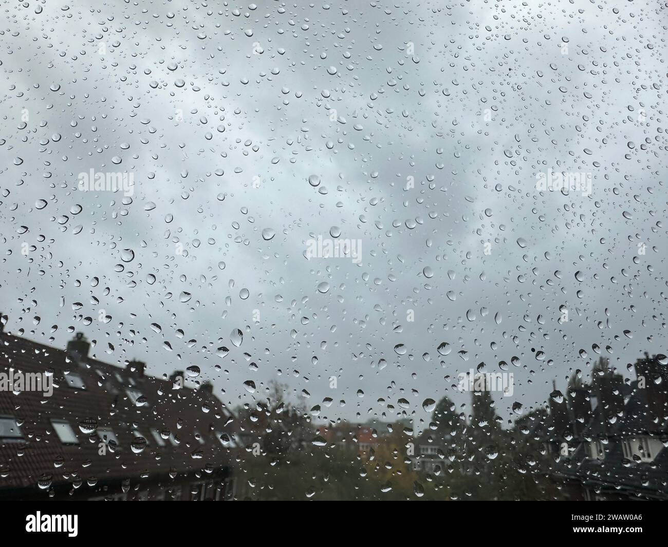 Window with water droplets on rainy day, closeup Stock Photo - Alamy