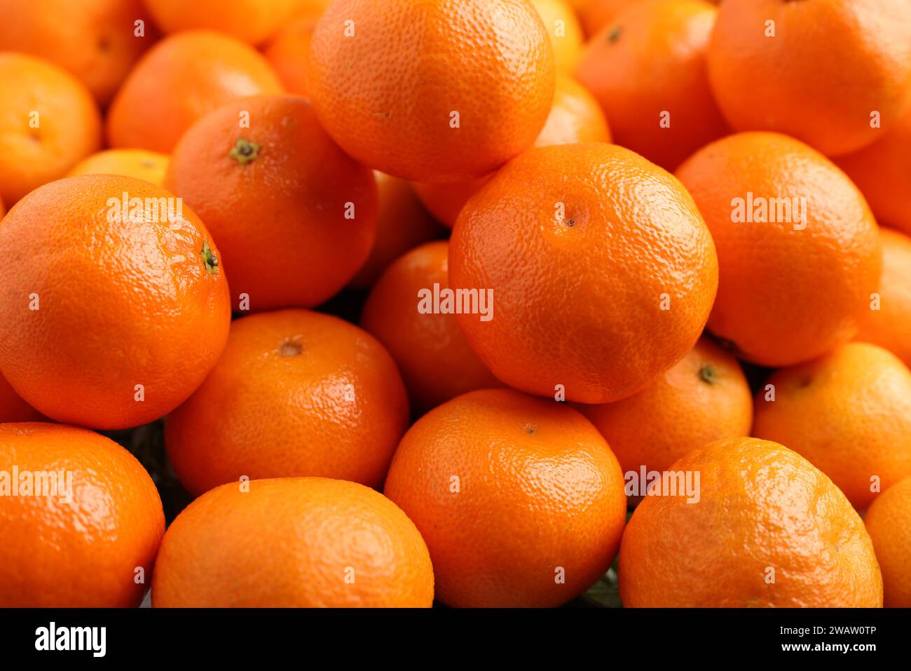 Delicious fresh tangerines as background, closeup view Stock Photo - Alamy