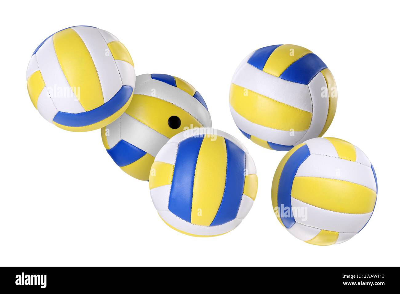 Many volleyball balls flying on white background Stock Photo - Alamy