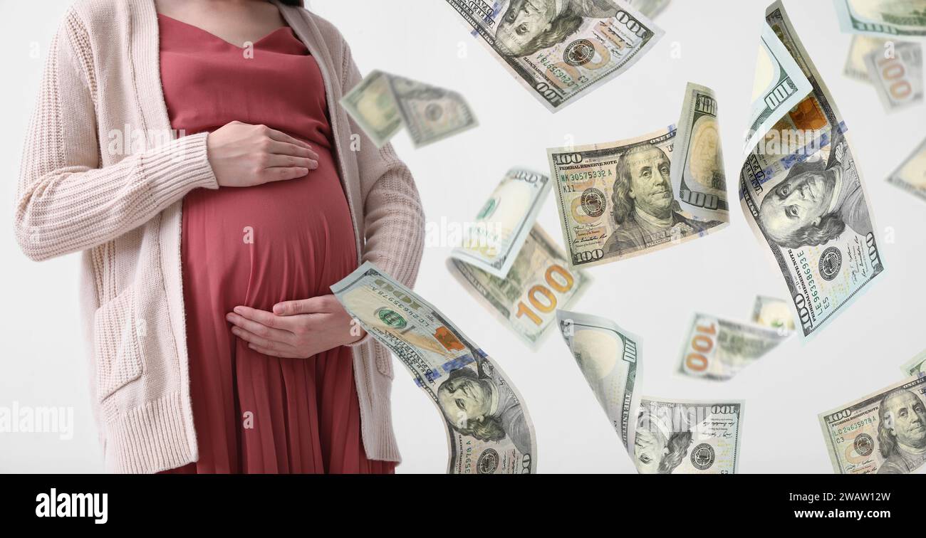 Surrogate mother under money shower on white background, closeup ...