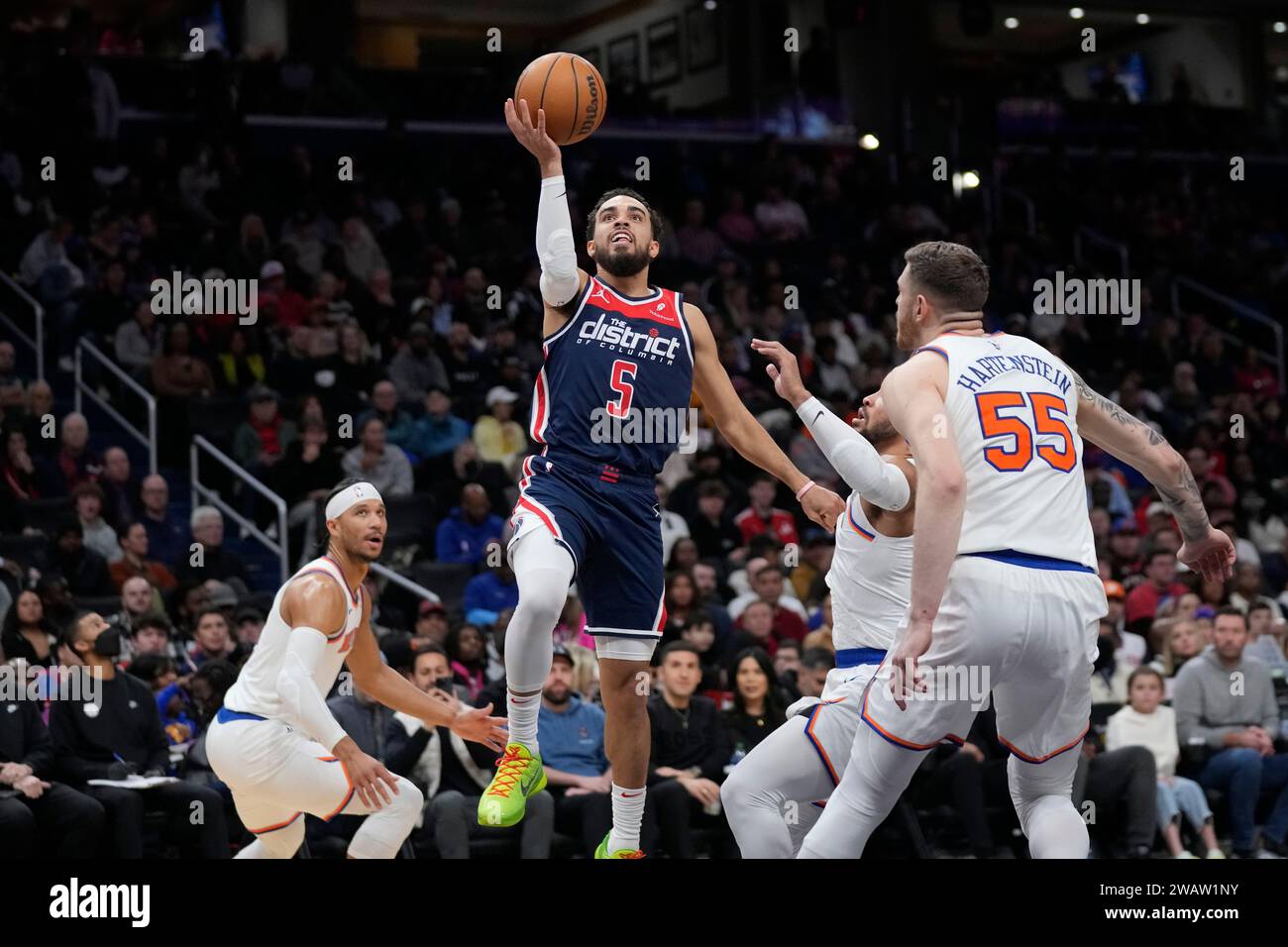 Washington Wizards guard Tyus Jones (5) shoots a layup against New York ...