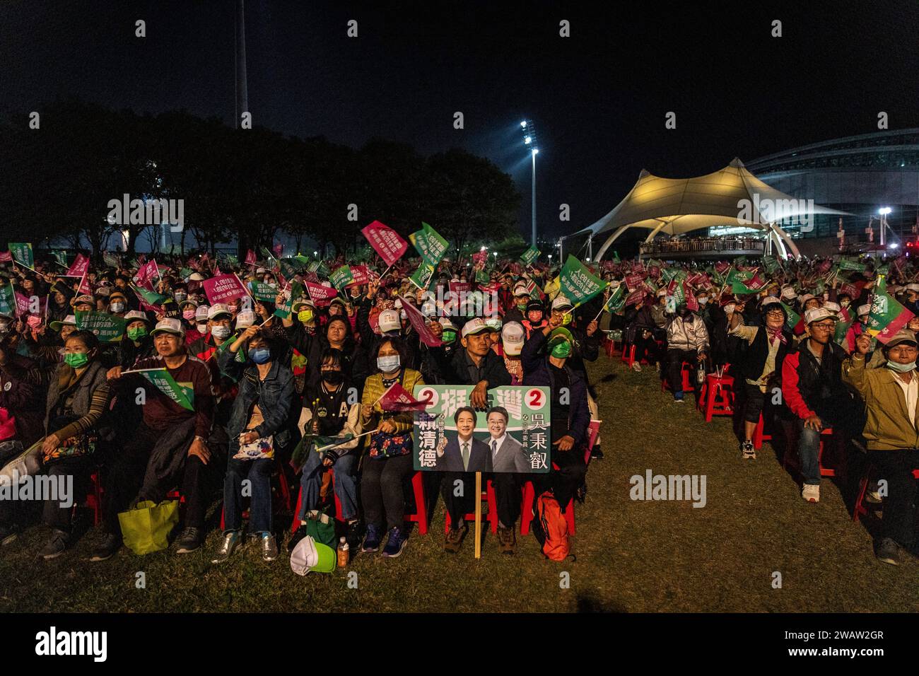 New Taipei, Taiwan. 06th Jan, 2024. Supporters wave flags during the ...