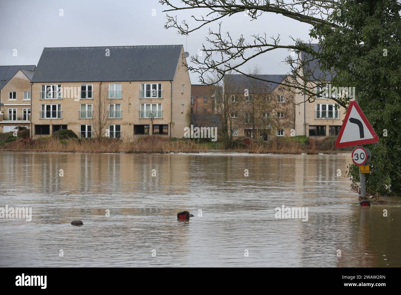 St Neots, UK. 06th Jan, 2024. A traffic sign stands redundant as flood ...