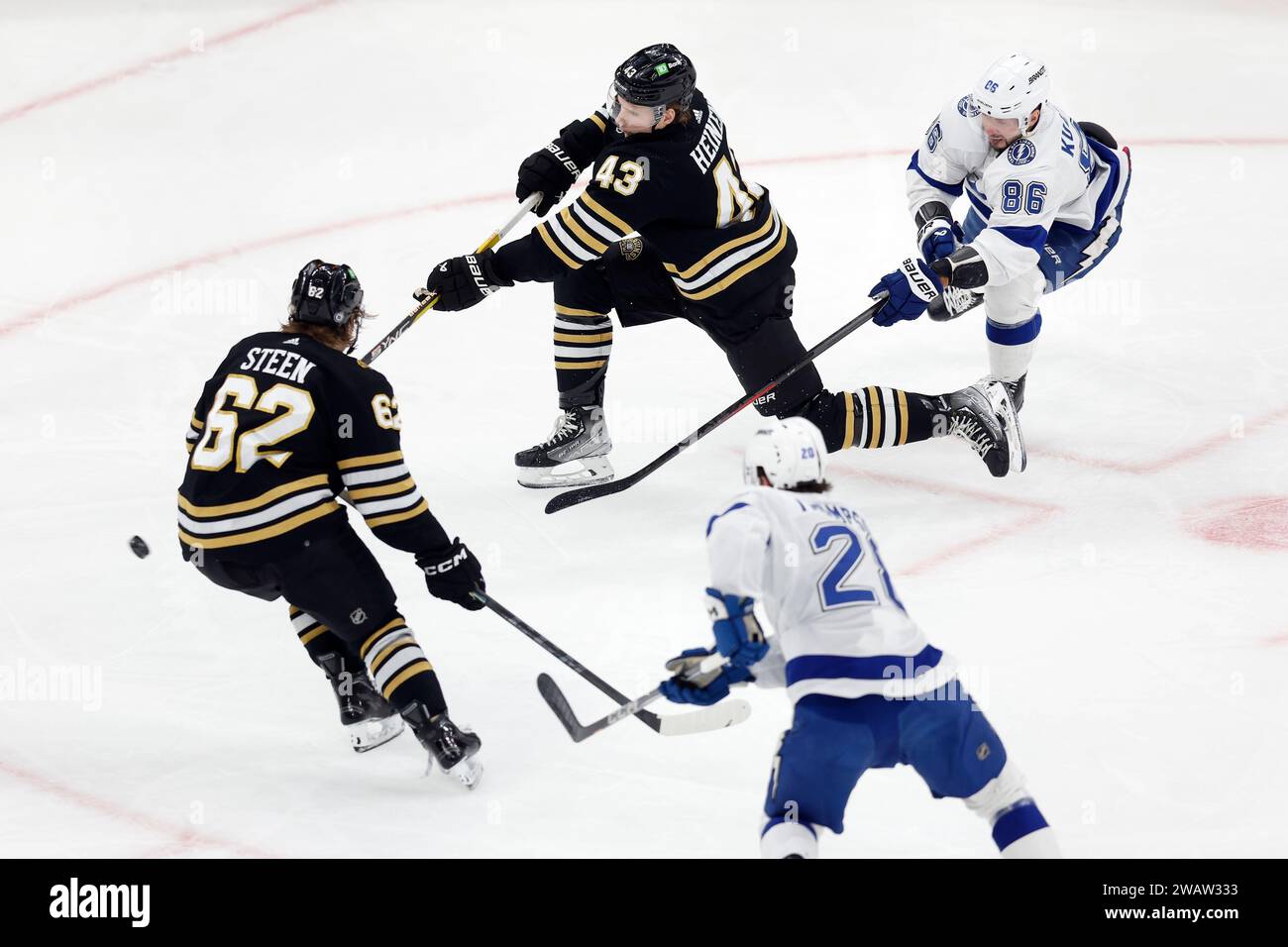 Boston Bruins' Danton Heinen (43) takes a shot in front of Oskar Steen ...