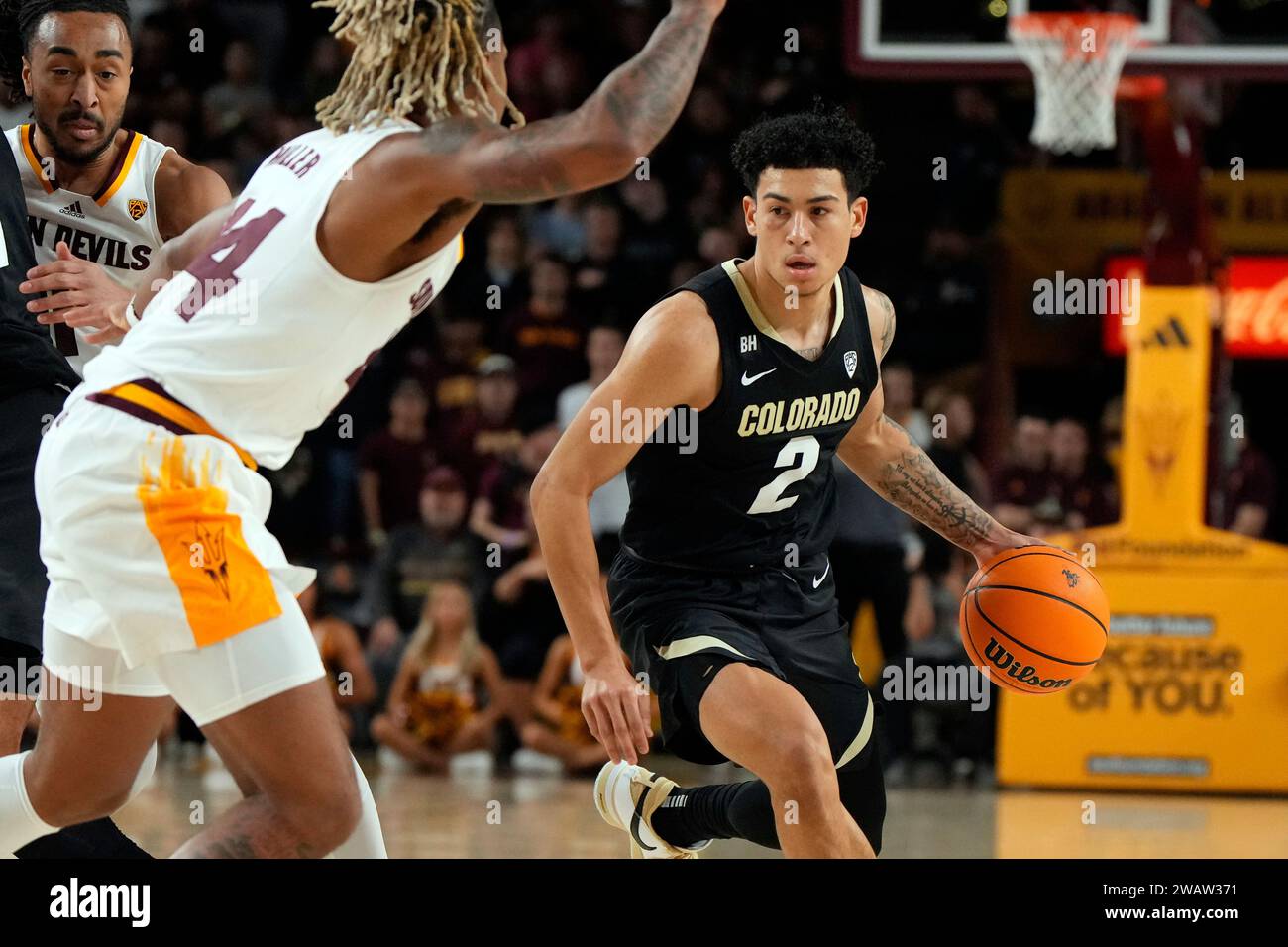 Colorado guard KJ Simpson (2) drives against Arizona State guard Adam ...