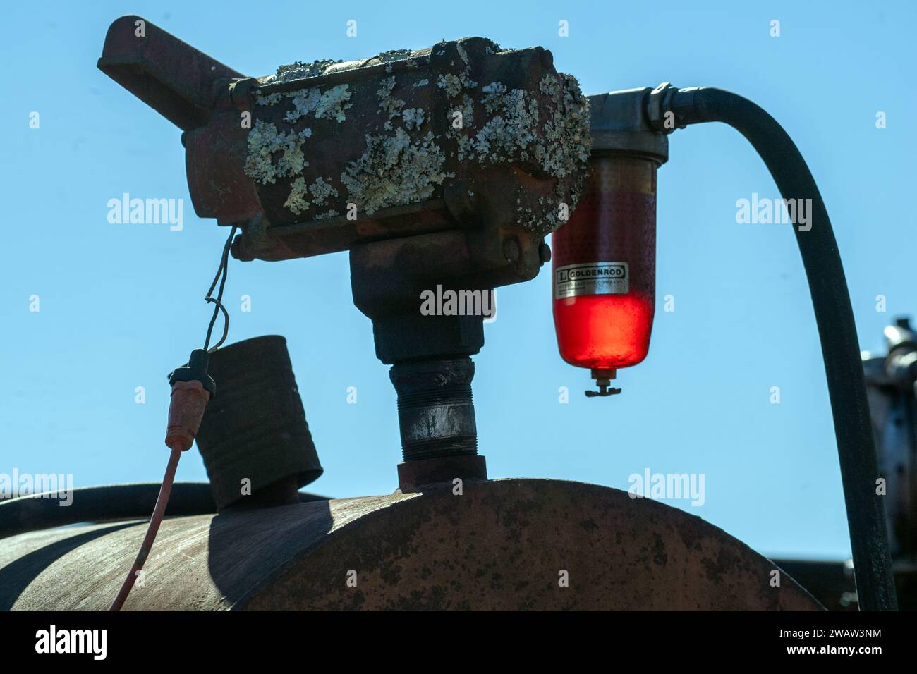 Antique fuel delivery systems on a working farm or ranch Stock Photo ...