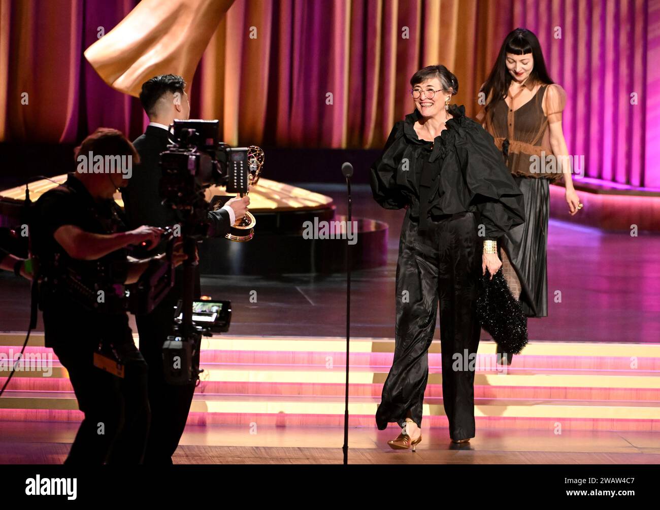 Basia Kuznar, Anna Lau, Sharon Long, and Claire Tremlett accept the Emmy for outstanding period ...