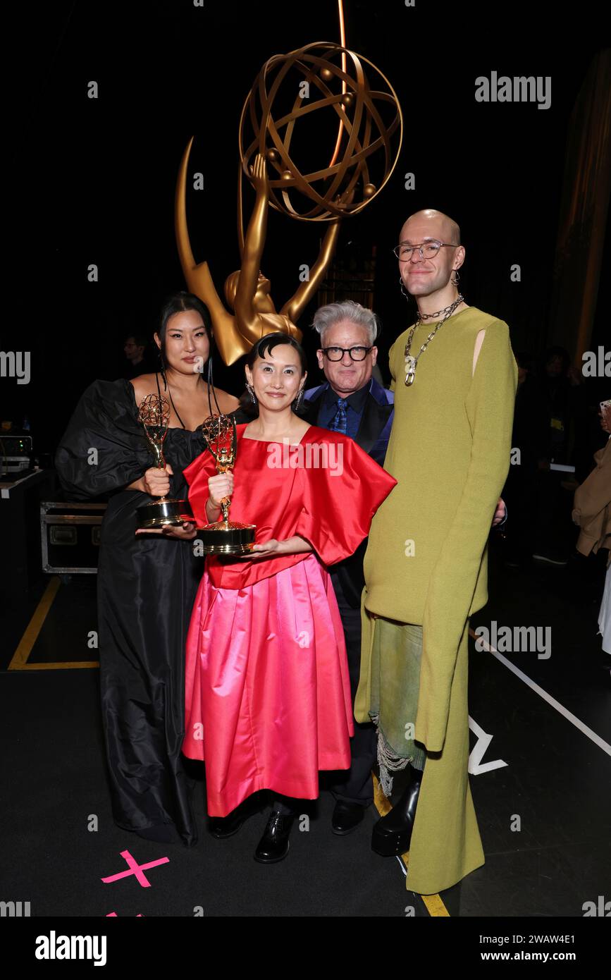 EXCLUSIVE - The team from "BEEF" pose with the award for outstanding ...