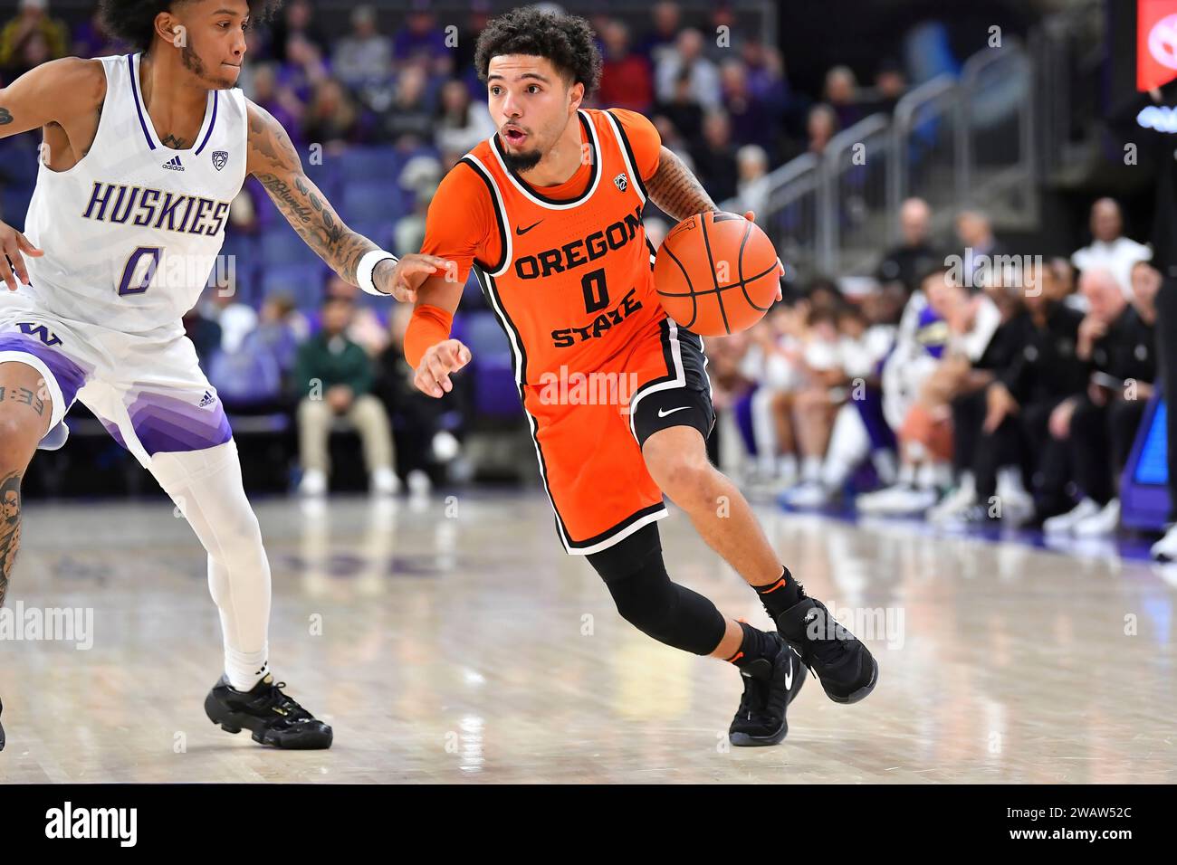 January 06, 2024: Oregon State Beavers guard Jordan Pope (0) drives to ...