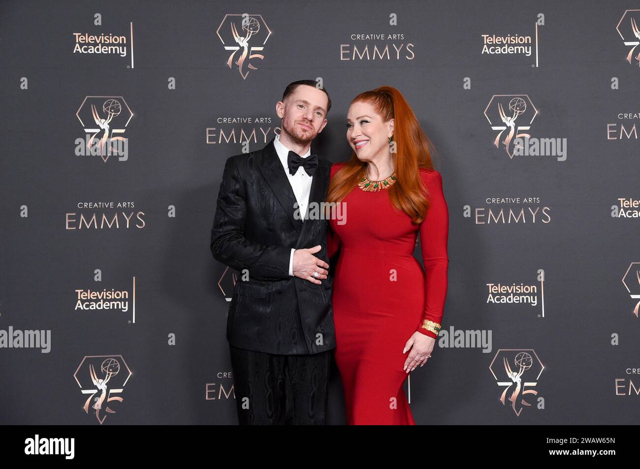Chris Perfetti, left, and Lisa Ann Walter pose in the press room during ...