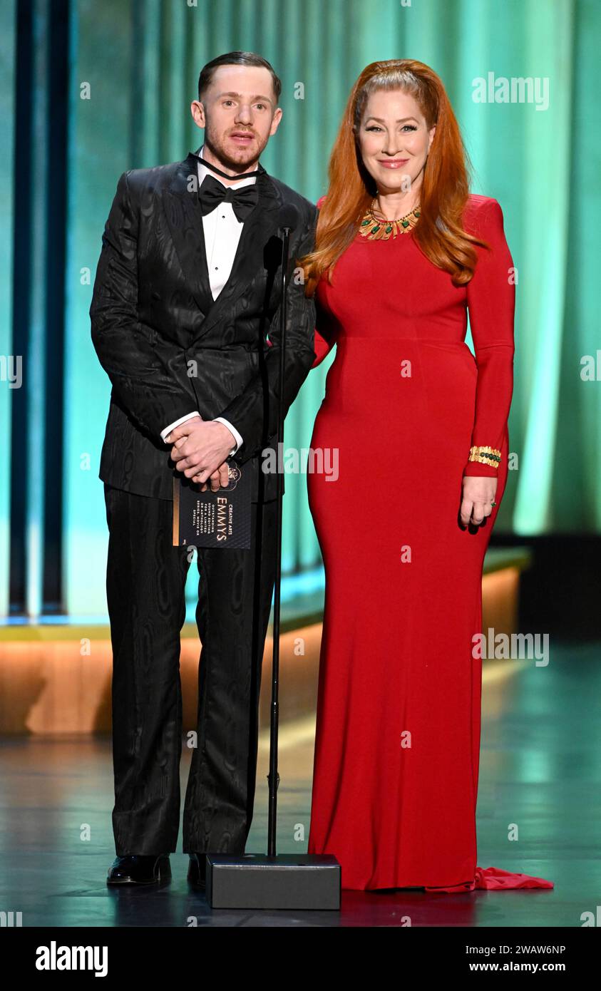 Chris Perfetti and Lisa Ann Walter present the Emmy for outstanding ...