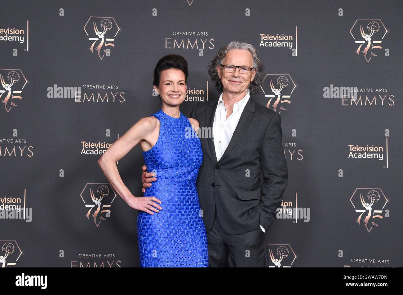 Carla Gugino, left, and Bruce Greenwood pose in the press room during ...