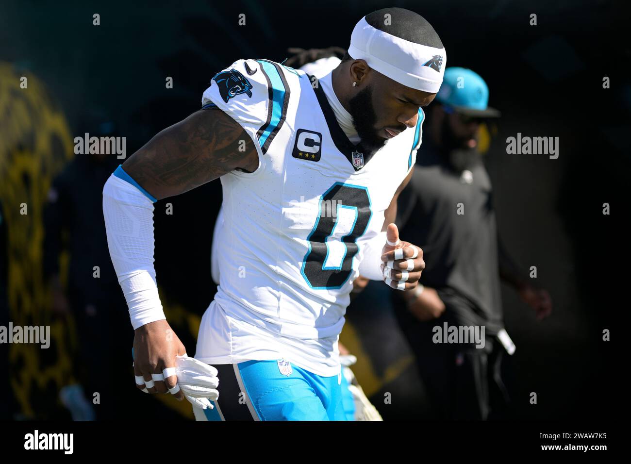 Carolina Panthers linebacker Brian Burns (0) heads to the field an NFL ...