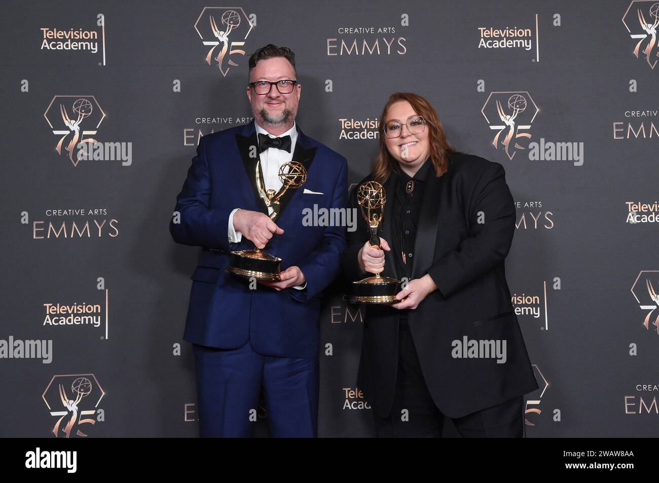 Timothy A. Good, left, and Emily Mendez pose in the press room with the ...