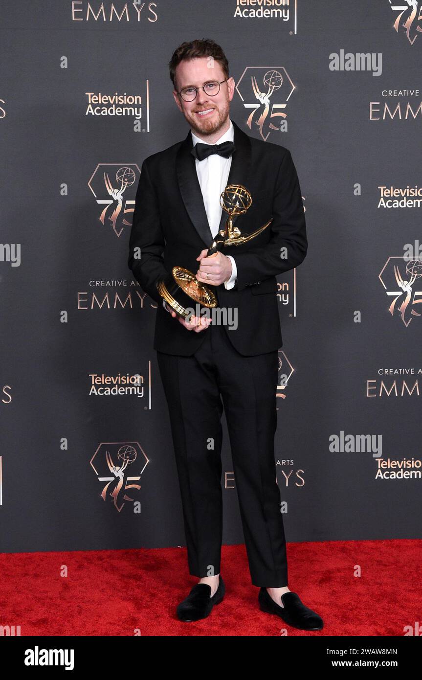 Christian Sprenger poses in the press room with the awards for ...
