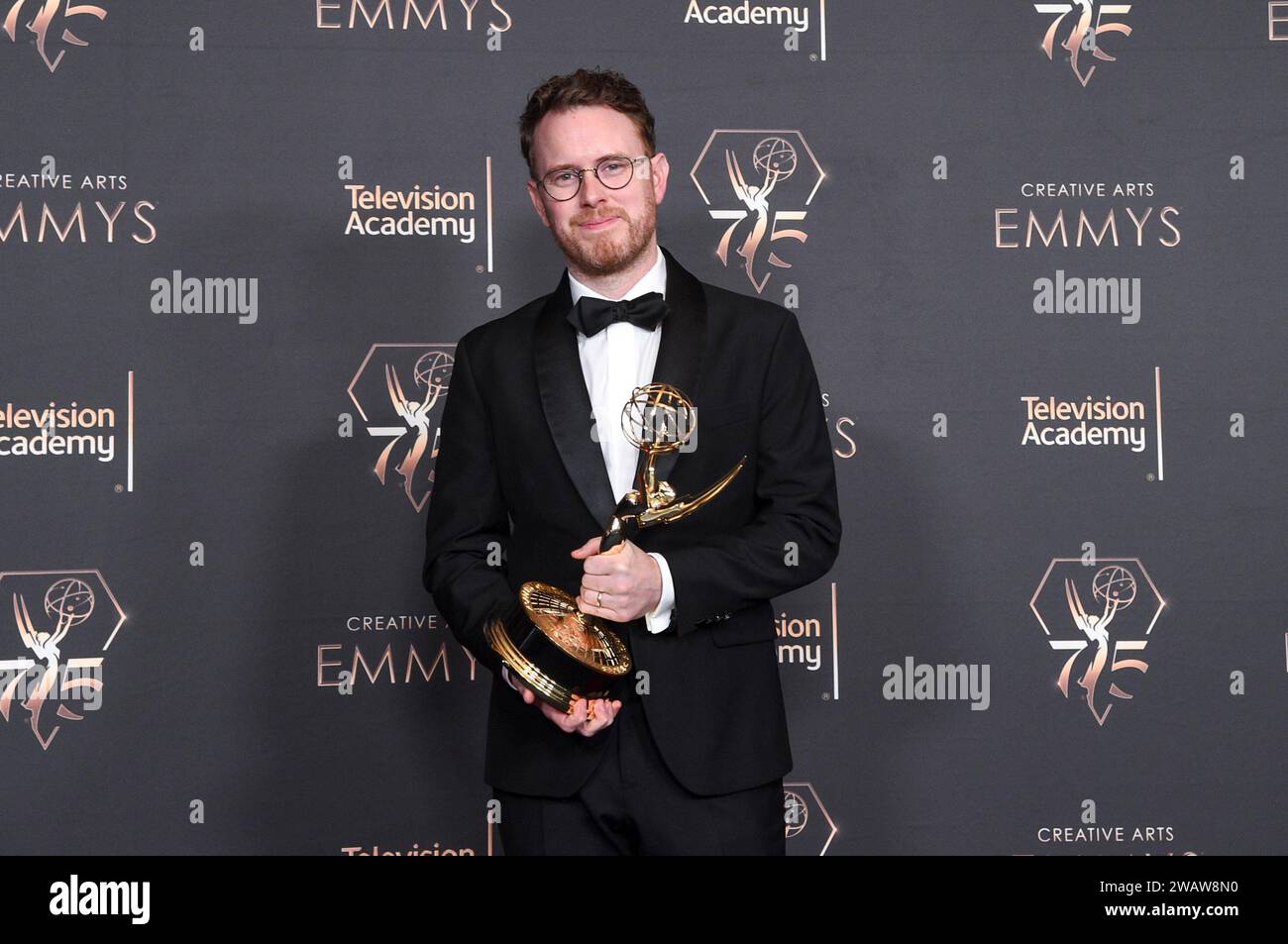 Christian Sprenger poses in the press room with the awards for ...