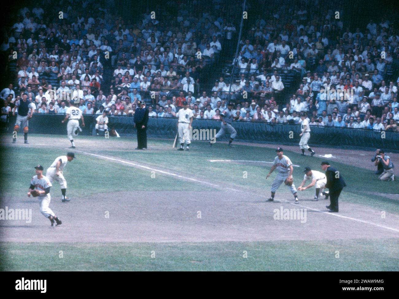 DETROIT, MI - JULY 5: Coot Veal #23 of the Detroit Tigers scores as ...