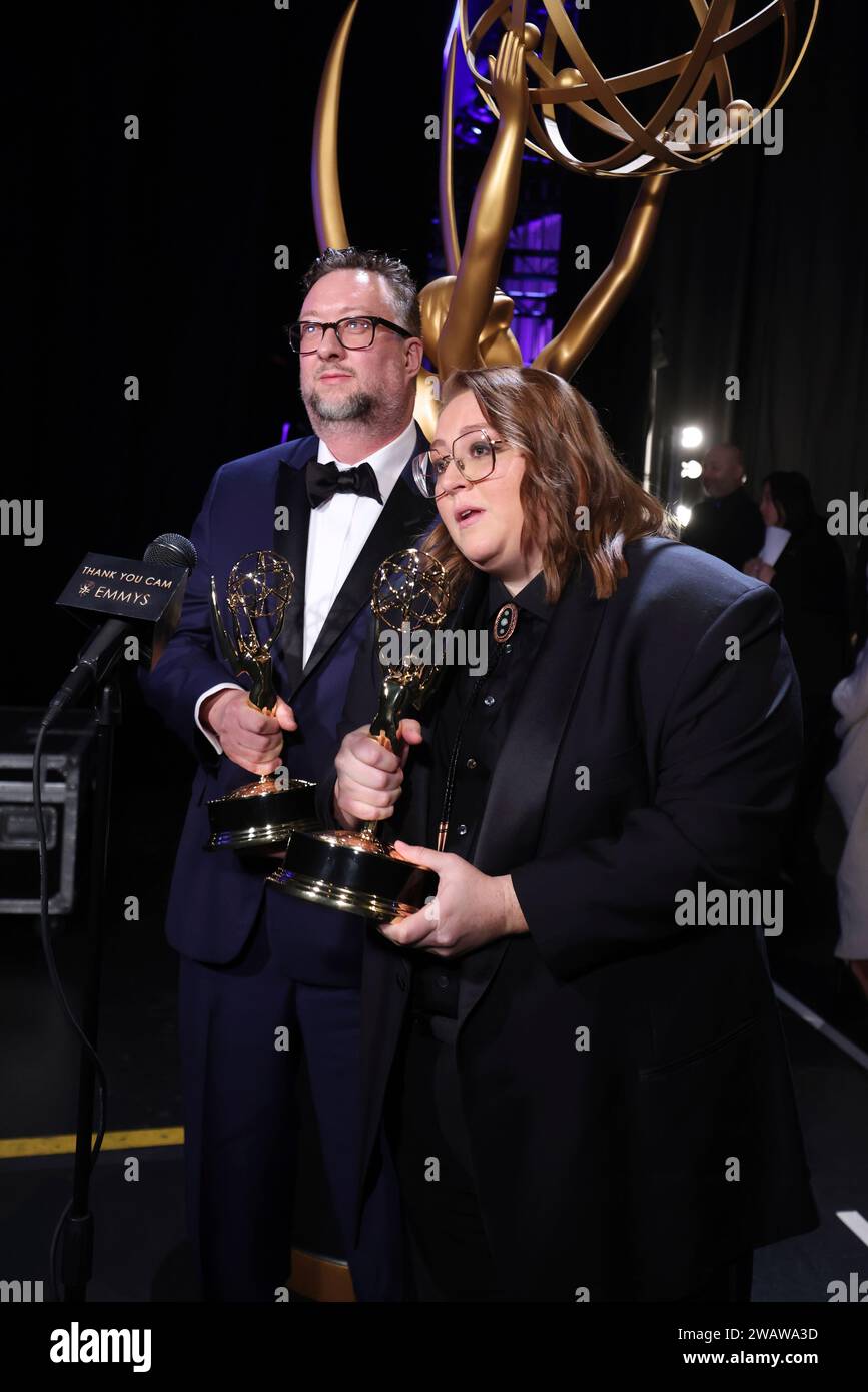 EXCLUSIVE - Timothy Good, left, and Emily Mendez accept the Emmy for ...