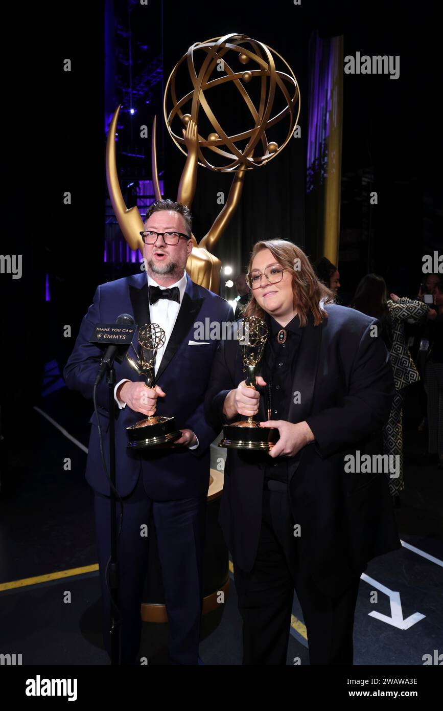 EXCLUSIVE - Timothy Good, left, and Emily Mendez accept the Emmy for ...