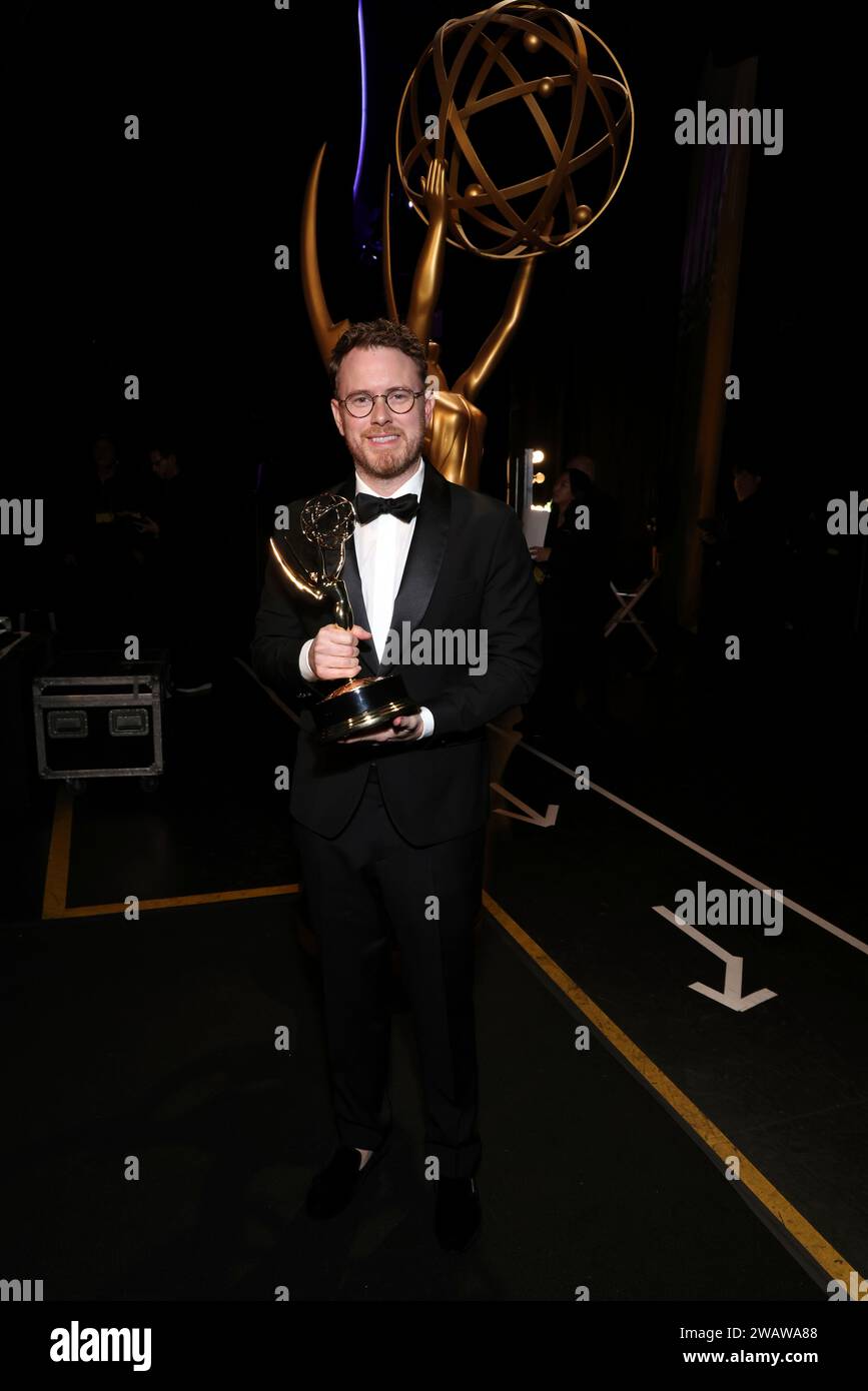 EXCLUSIVE - Christian Sprenger poses with the Emmy for outstanding ...