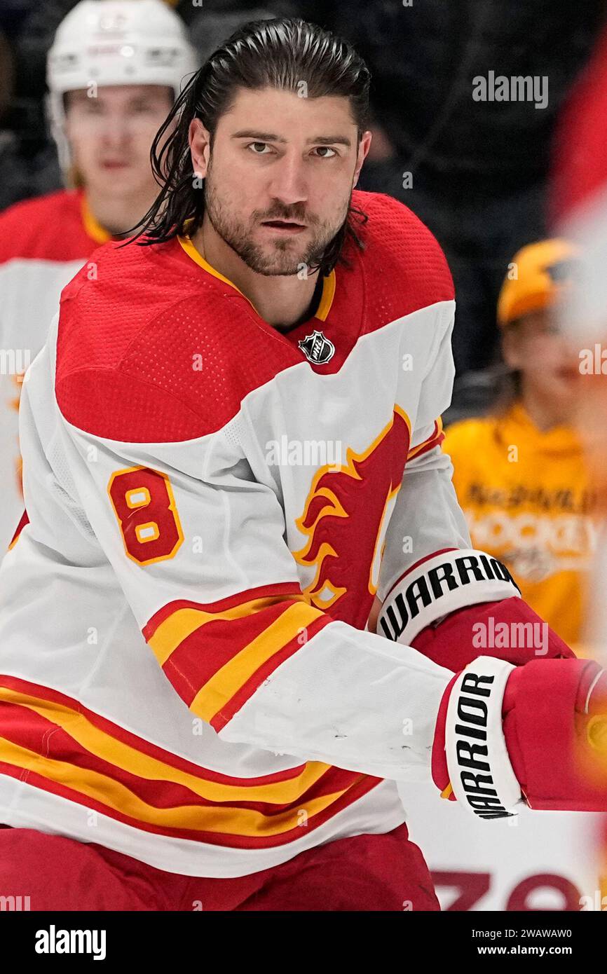 Calgary Flames defenseman Chris Tanev (8) warms up before the team's ... Calgary Flames defenseman Chris Tanev (8) warms up before the team's ...
