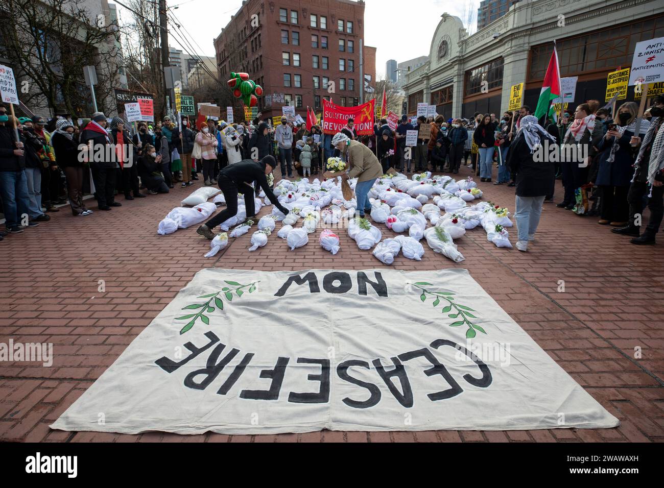 Seattle, Washington, USA. 6th January, 2024. Shrouded effigies of dead ...