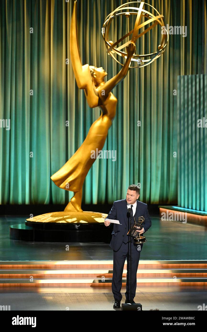Nick Offerman accepts the Emmy for outstanding guest actor in a drama ...
