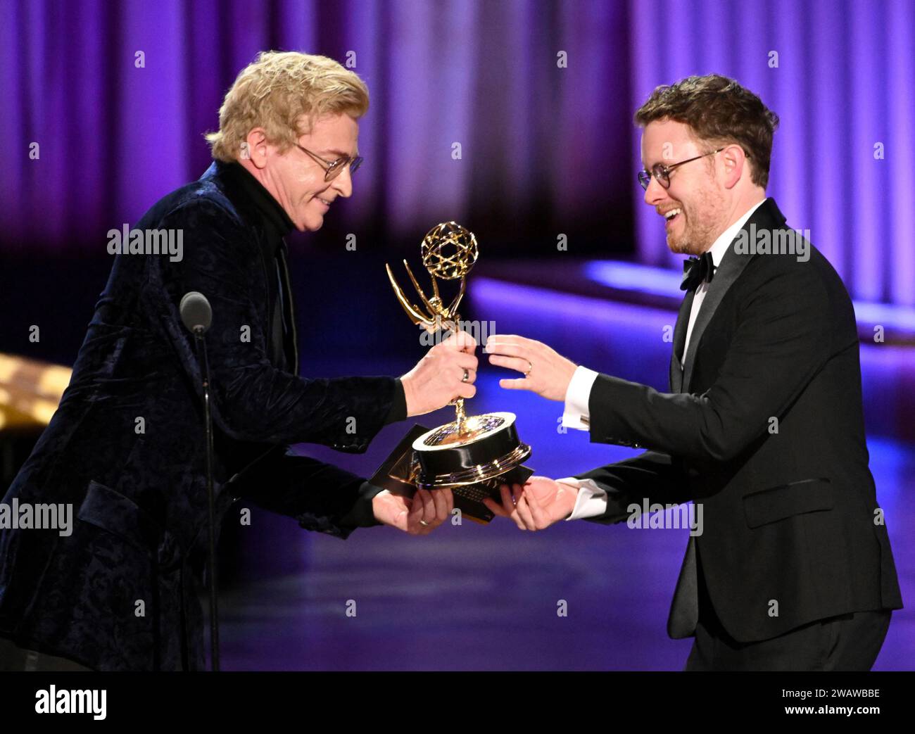 Christian Sprenger accepts the Emmy for outstanding cinematography for ...
