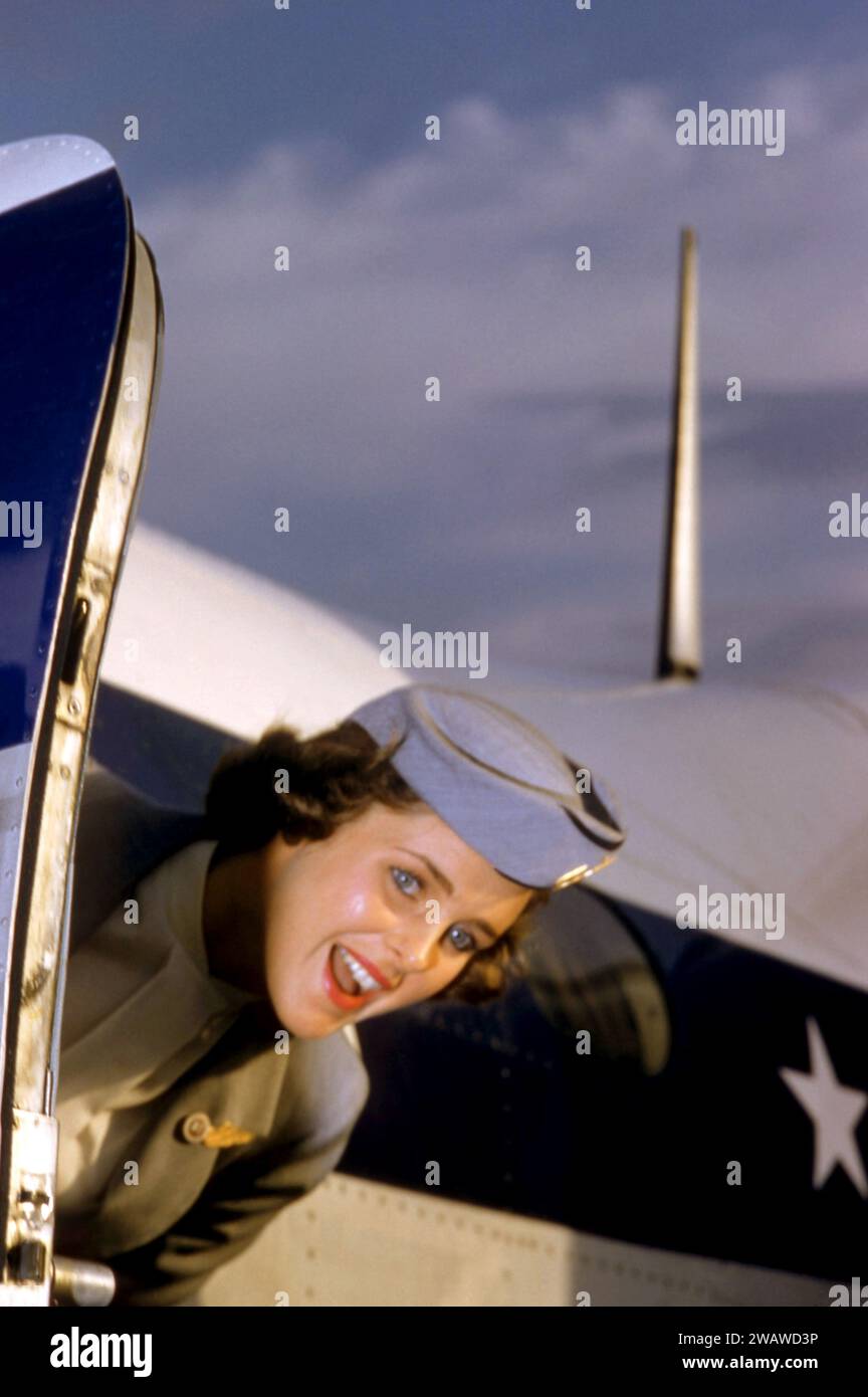 MIAMI, FL - 1958: Sue Kehner, a flight attendant for National Airlines, poses for a portrait ...