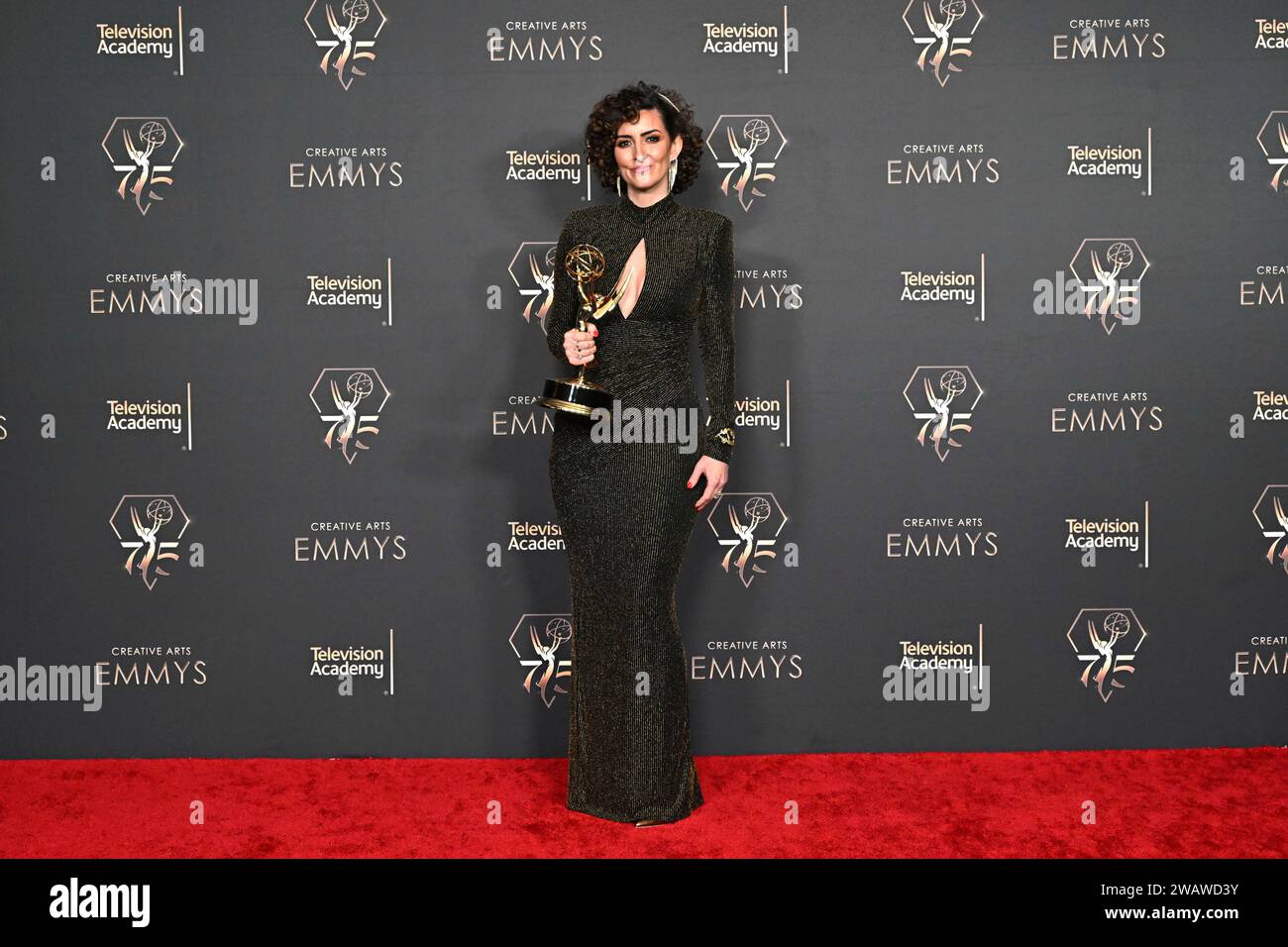 Natalie Kingston with their Emmy for outstanding cinematography for a ...