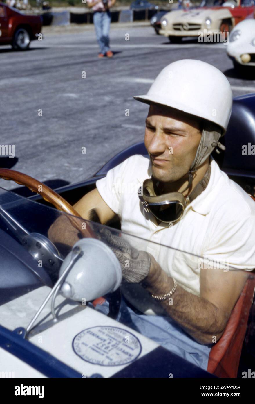 NASSAU, BAHAMAS - DECEMBER 5: Stirling Moss #1 of England sits in his ...